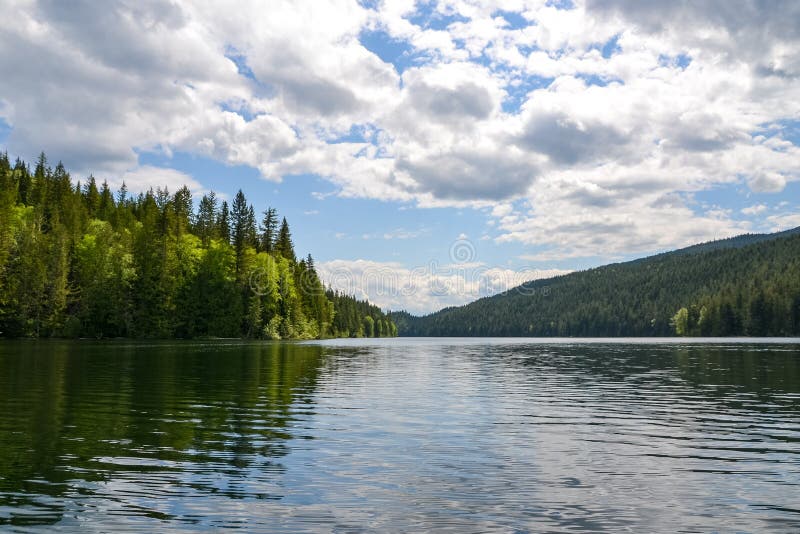 Reflections on Clearwater Lake Stock Photo - Image of blue, hill: 164592942
