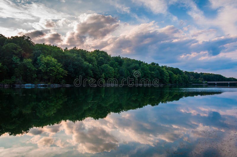 Reflections of Clouds and Trees in Lake Marburg, Codorus State P Stock ...