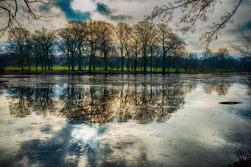 Reflections in icey water stock photo. Image of water - 164578572
