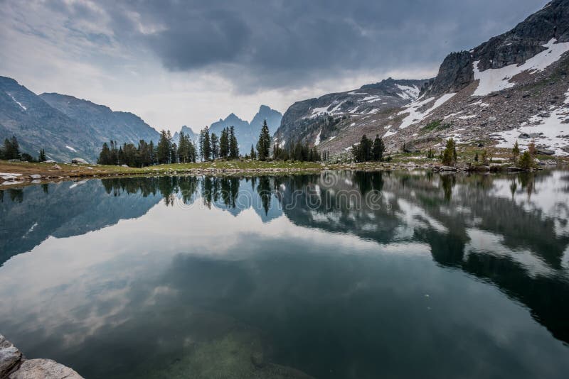 Reflections in Lake Solitude Stock Photo - Image of grand, reflection ...