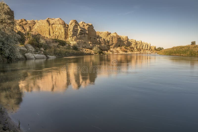 Reflections in the Milk River at Writing on Stone Stock Image - Image ...