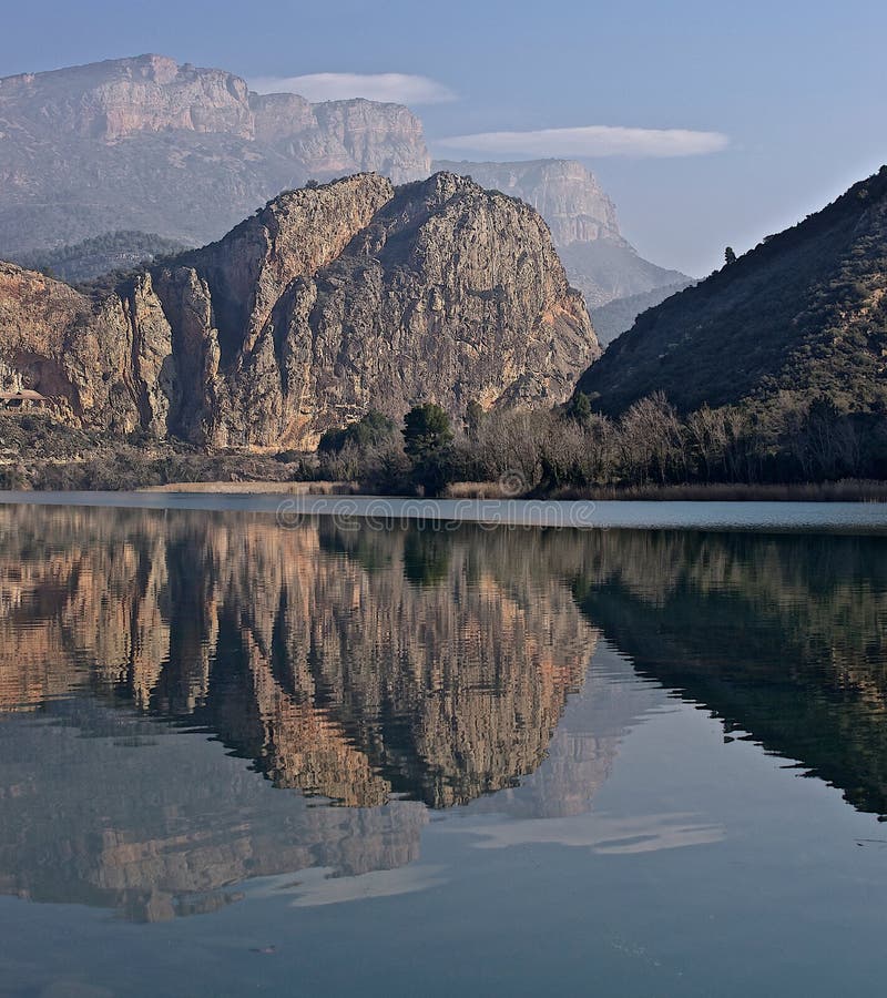 Reflections of a Mountain in a Reservoir Stock Photo - Image of ...