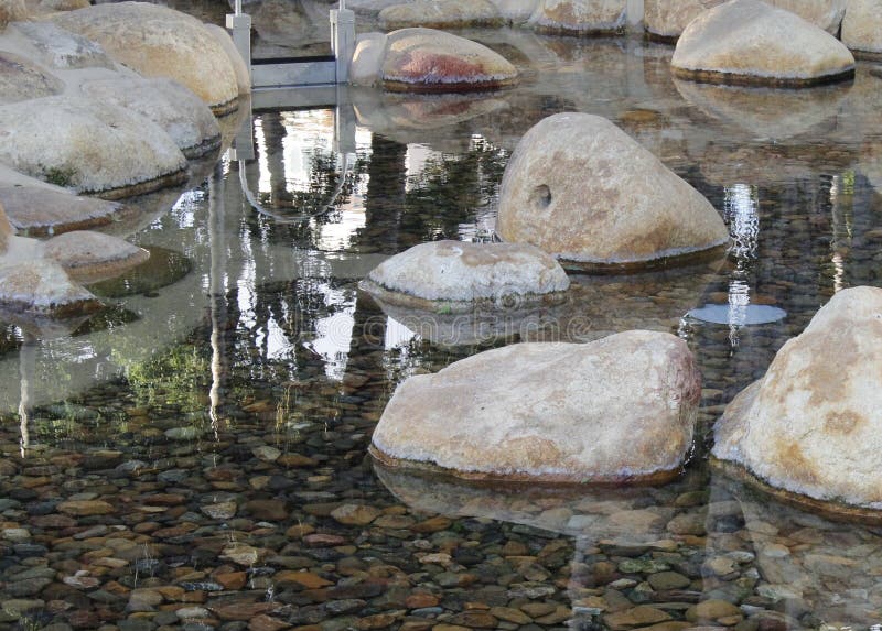 Reflections in a rock pool stock photo. Image of gate - 55326096