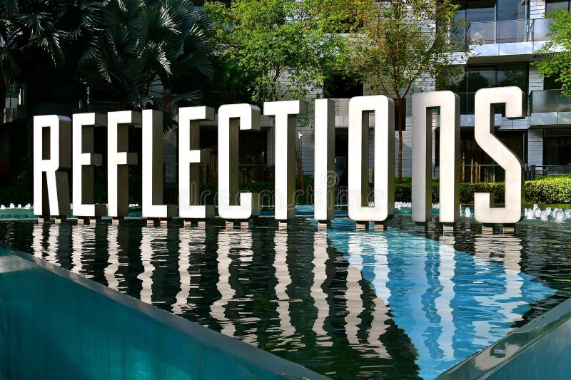 Reflections sign on water stock photo. Image of reflection - 155010202