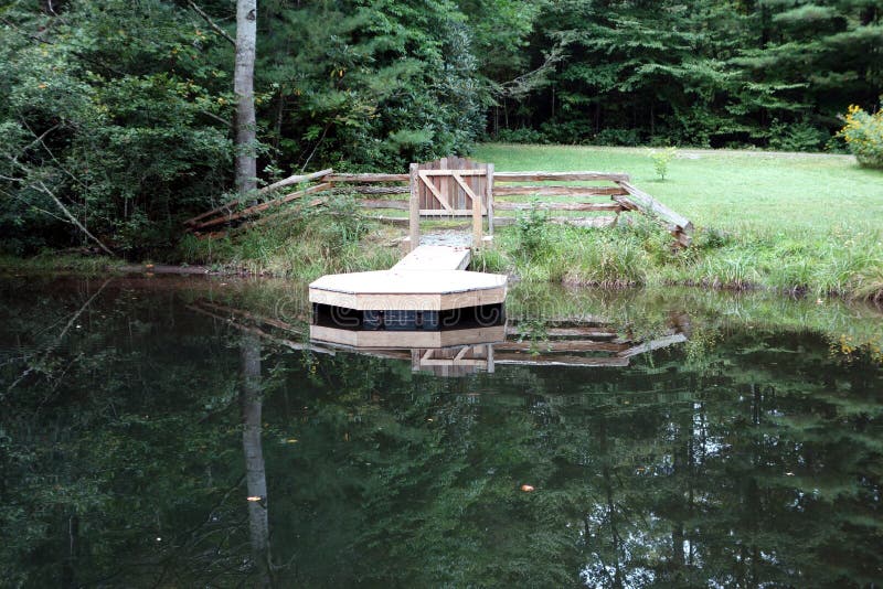 Reflections in a Still Pond Stock Image - Image of beautiful, pond ...