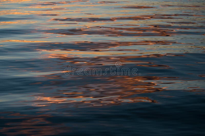 Reflections on the Water at Sunset Stock Photo - Image of lake, marine ...