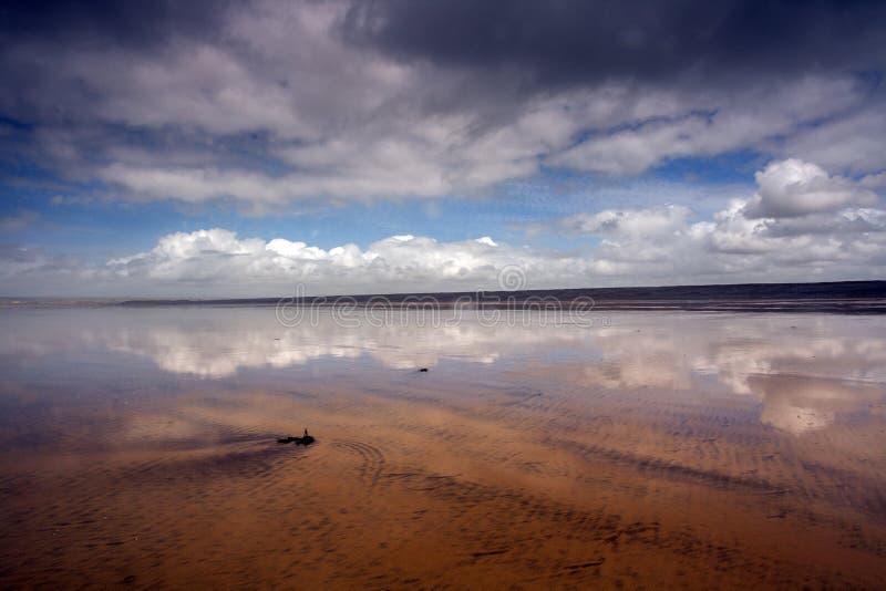 Reflective Beach Scene at Westward Ho! Stock Image - Image of ...