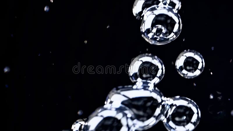 Reflective Bubbles Rising on a Black Background Stock Video - Video of ...