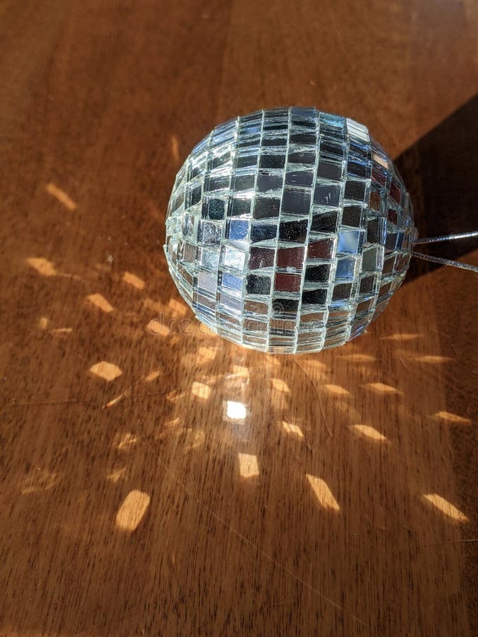 Reflective Disco Ball Reflecting Sunlight Wooden Table Stock Photos ...