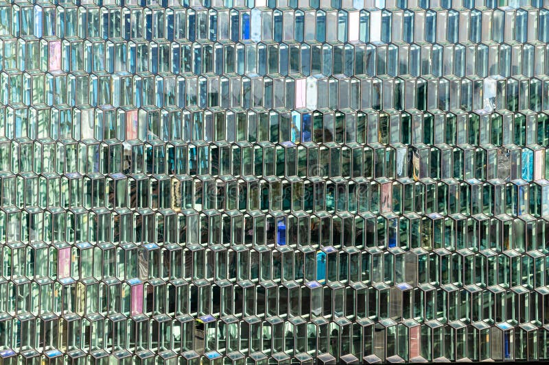 Reflective Glass Block Wall with Intricate Patterns and Colorful ...