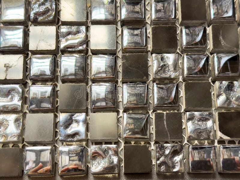 Reflective Metallic Cubes with Varied Textures and Light Patterns Stock ...