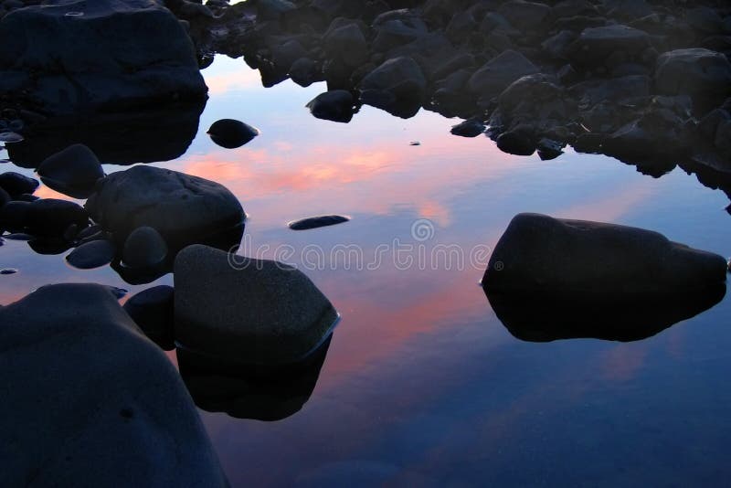 Reflective Rocks stock photo. Image of clouds, still, calm - 181798
