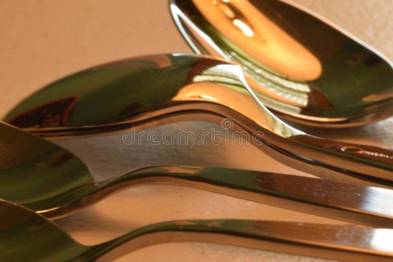 Reflective Spoons Showcasing Their Shine Stock Photo - Image of ...