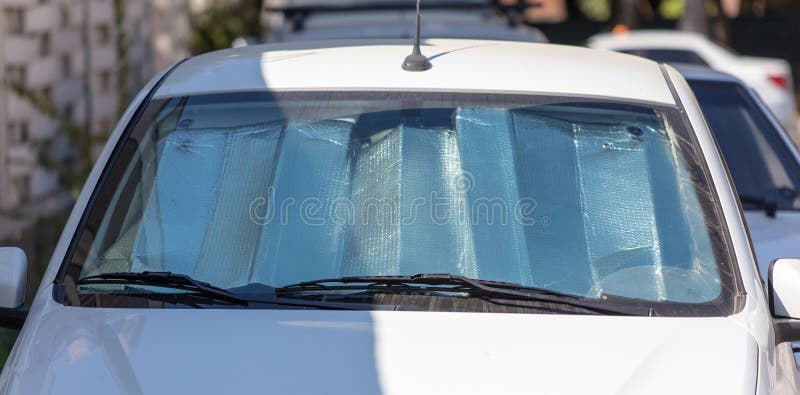 Reflective Sun Protection on Car Windshield Stock Photo - Image of ...