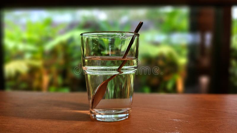 The Refraction Example, the Part of the Spoon Inside Water Appears To ...