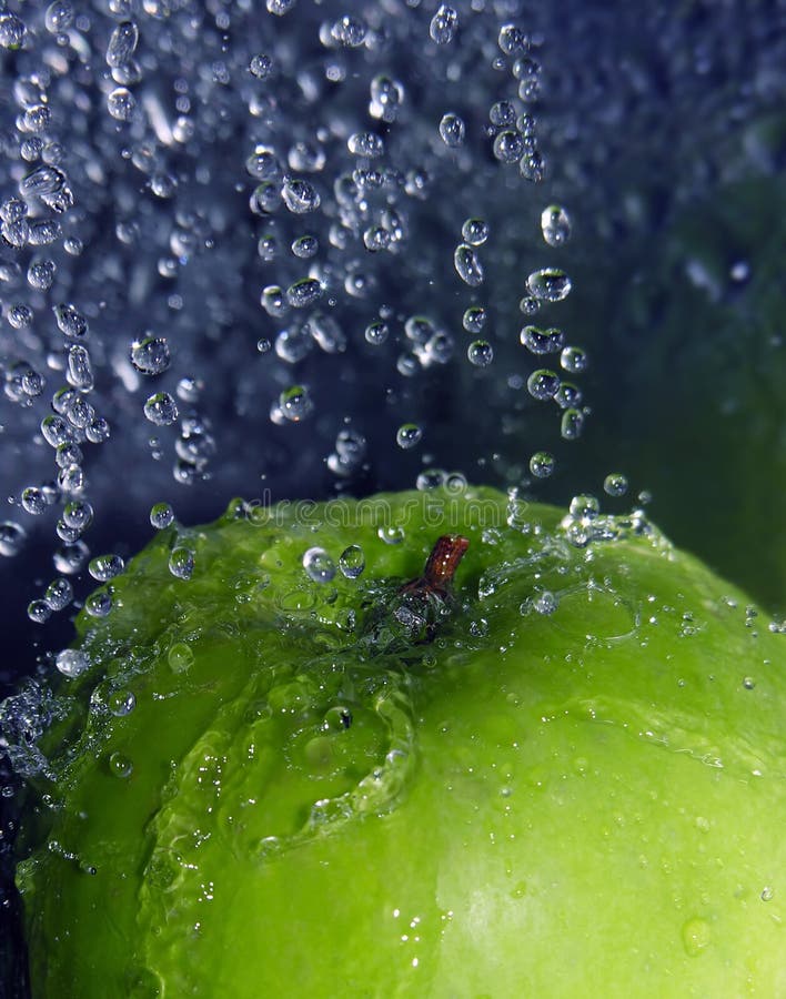 Refreshing apple stock photo. Image of splashing, dropping - 3590608