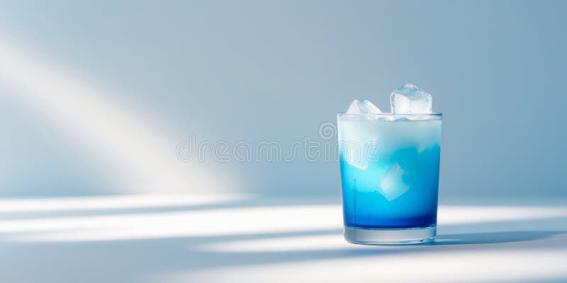 Refreshing Beverage with Ice in a Vibrant Blue and White Gradient Stock ...