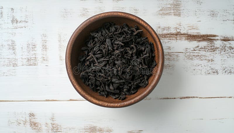 Refreshing Black Tea in a Cup on a Wooden Table on a White Background ...