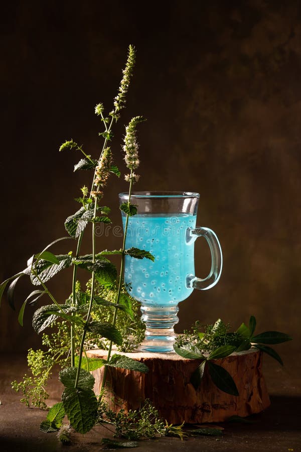 Refreshing Blue Drink with Baslic Grains and Blooming Fresh Mint Stock ...