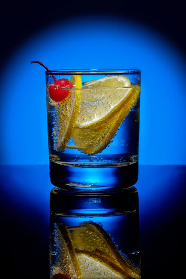 Refreshing Blue Hawaii Cocktail Punch with Lemon and Cherry Stock Image ...