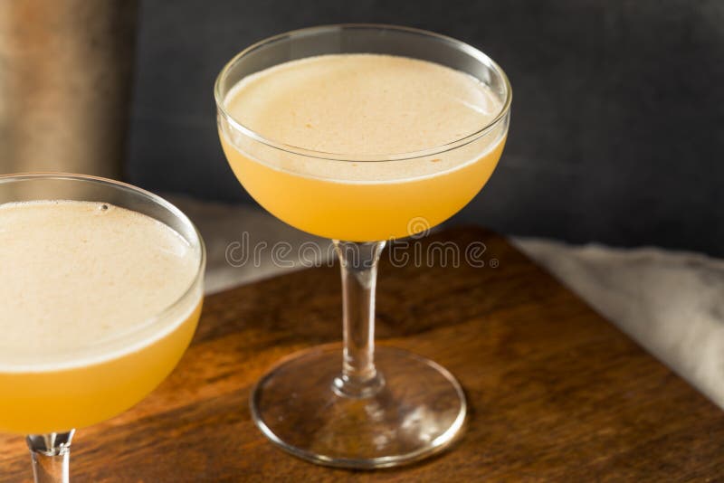 Refreshing Boozy Whiskey Daisy Cocktail Stock Photo - Image of glass ...