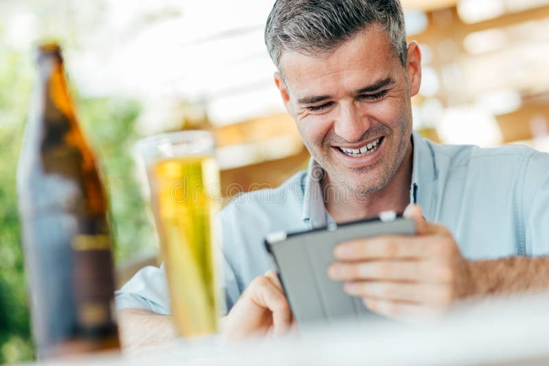Refreshing Break at the Bar Stock Image - Image of networking ...