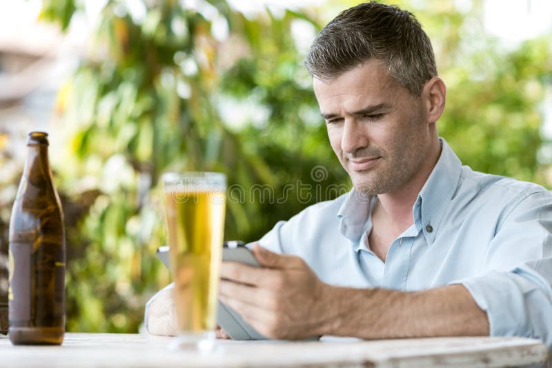 Refreshing Break at the Bar Stock Image - Image of communication, adult ...
