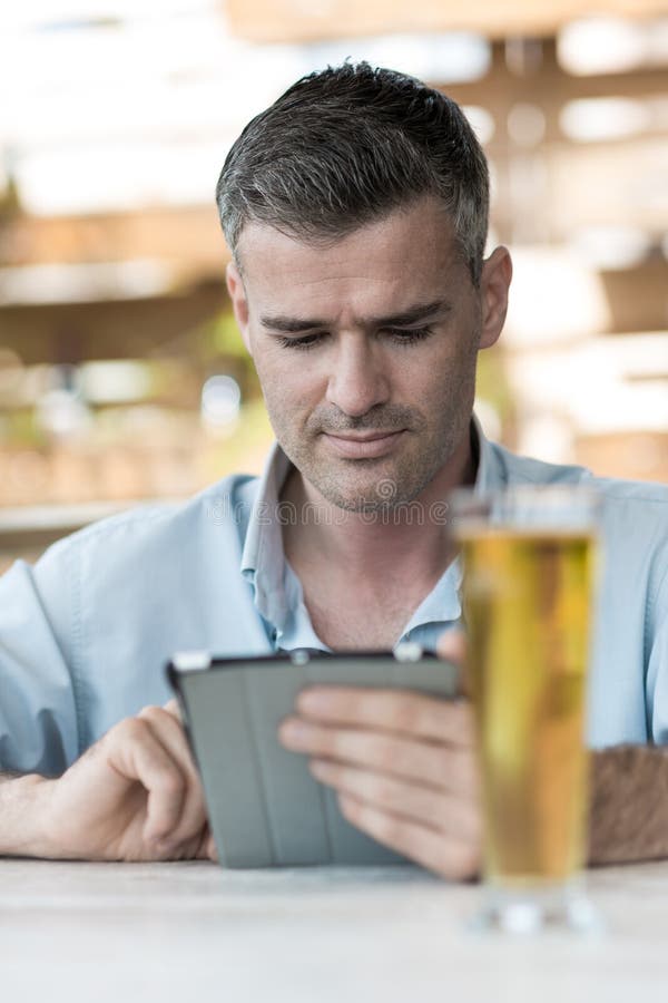 Refreshing Break at the Bar Stock Photo - Image of drinking, smiling ...
