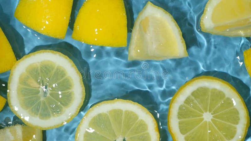 Refreshing Citrus Background with Floating Lemon Pieces Stock Footage ...