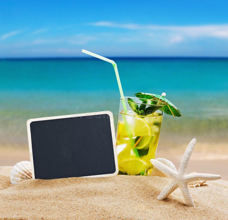 Refreshing Cocktail on the Sea Sand with Shells Stock Image - Image of ...