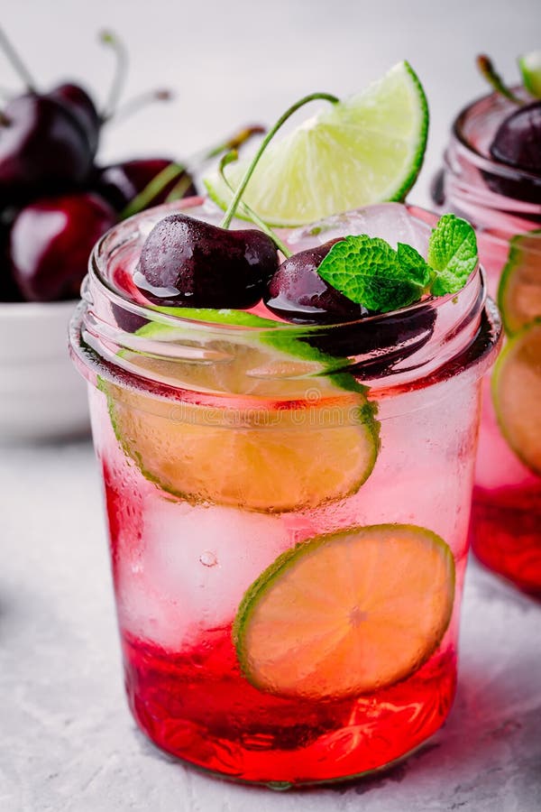 Lime Lemonade with Rosemary and Ice, Dark Toned Image, Selective Stock ...