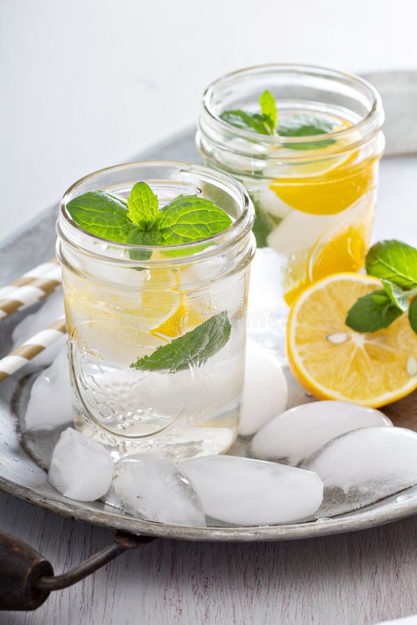 Refreshing Cold Water with Lemon and Mint Stock Photo - Image of drink ...