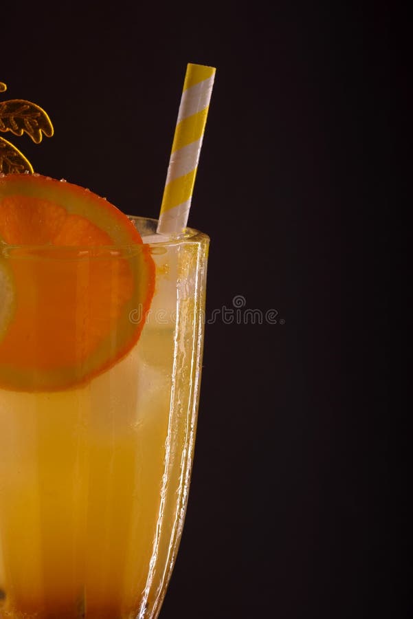 Refreshing Cool Mango Rum Collins on the Bar Counter. Cocktail at a ...