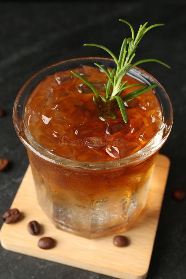 Refreshing Espresso Tonic Drink with Rosemary and Coffee Beans on Dark ...
