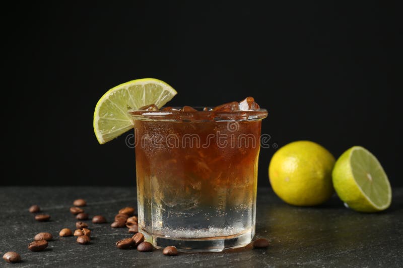 Refreshing Espresso Tonic Drink with Slice of Lime and Coffee Beans on ...