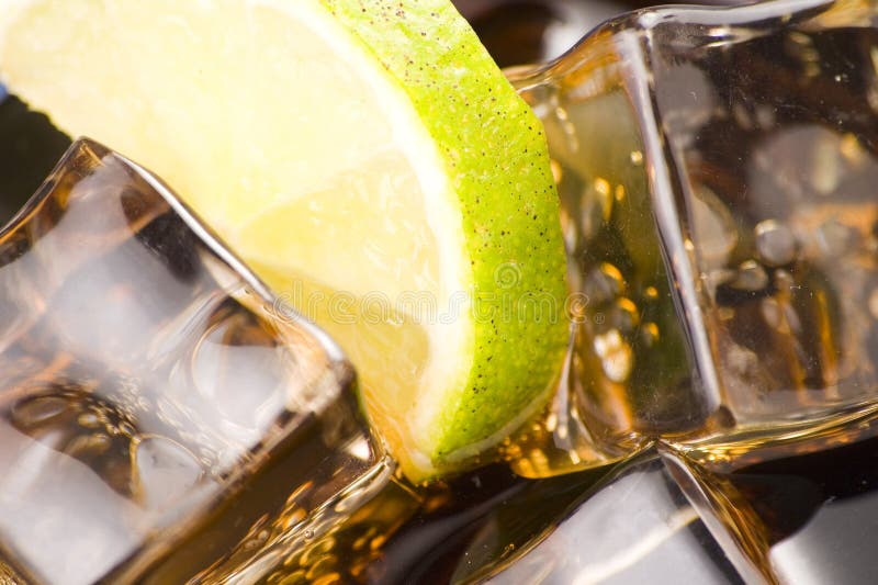 Refreshing Glass of Cola with Lemon and Ice Stock Image - Image of ...
