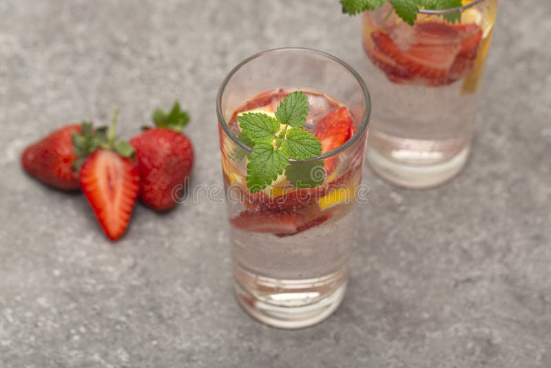 Refreshing Ice Cold Strawberry Lemonade on Grey Table Stock Image ...