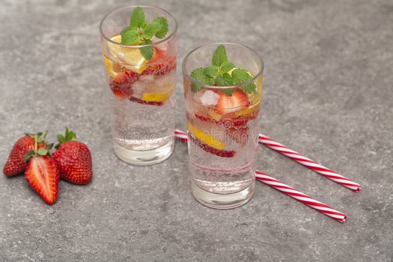 Refreshing Ice Cold Strawberry Lemonade on Grey Table Stock Image ...