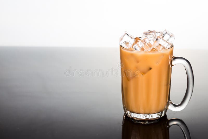 Refreshing Ice Cold Tea with Milk in Transparent Glass Stock Image ...