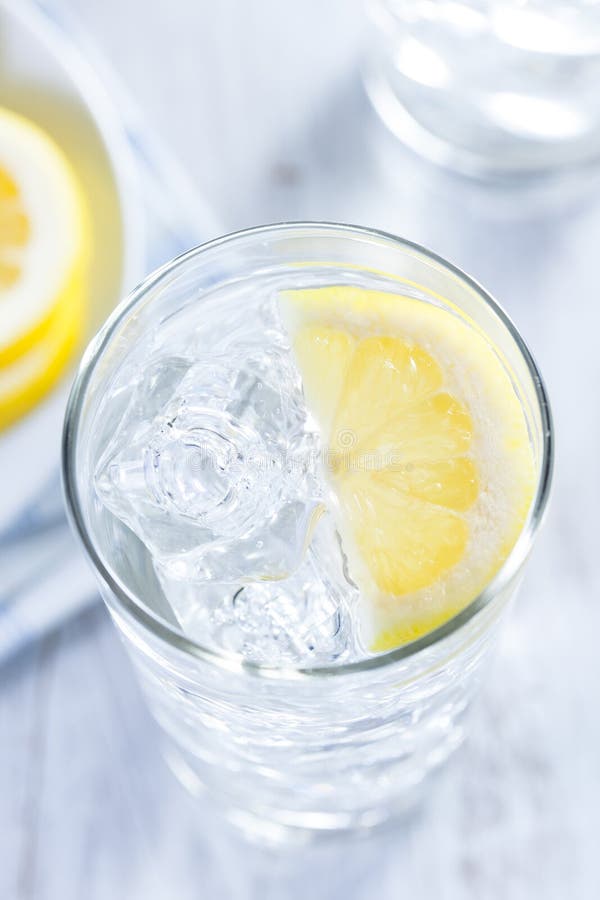 Refreshing Ice Cold Water with Lemon Stock Photo - Image of refreshing ...