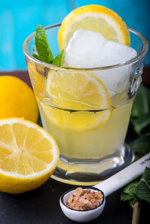 Refreshing Lemonade with Fresh Citrus , Mint and Ice in Glass Stock ...