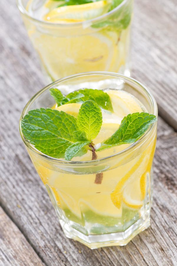 Refreshing Mint Lemonade in Glasses, Close-up, Vertical Stock Photo ...