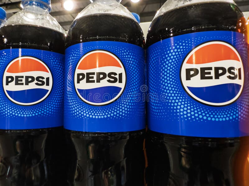 Refreshing Pepsi Soft Drinks Displayed on Shelves at a Retail Store ...
