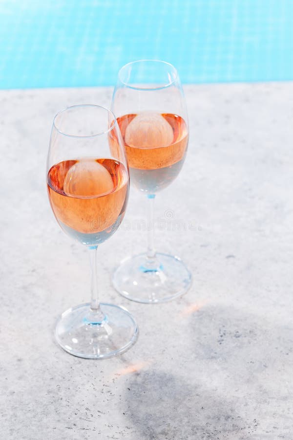 Refreshing Rose Wine by the Pool on a Sunny Day Stock Image - Image of ...