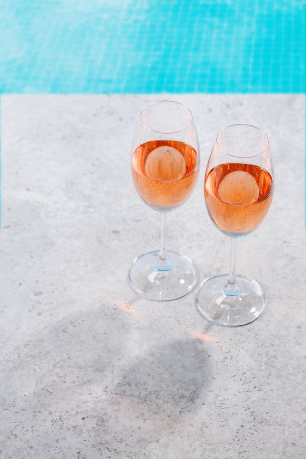 Refreshing Rose Wine by the Pool on a Sunny Day Stock Photo - Image of ...