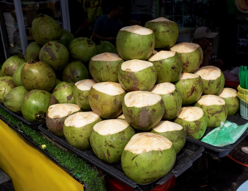 A Refreshing Stack of Young Coconuts, Ready To Quench Your Thirst ...