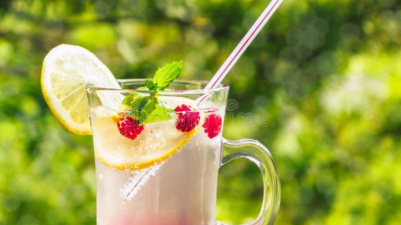 Refreshing Summer Cocktail with Lemon, Raspberry and Mint Close-up ...