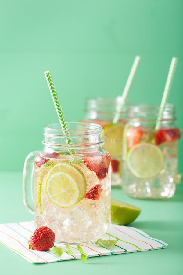 Refreshing Summer Lemonade with Strawberry and Lime in Mason Jar Stock ...