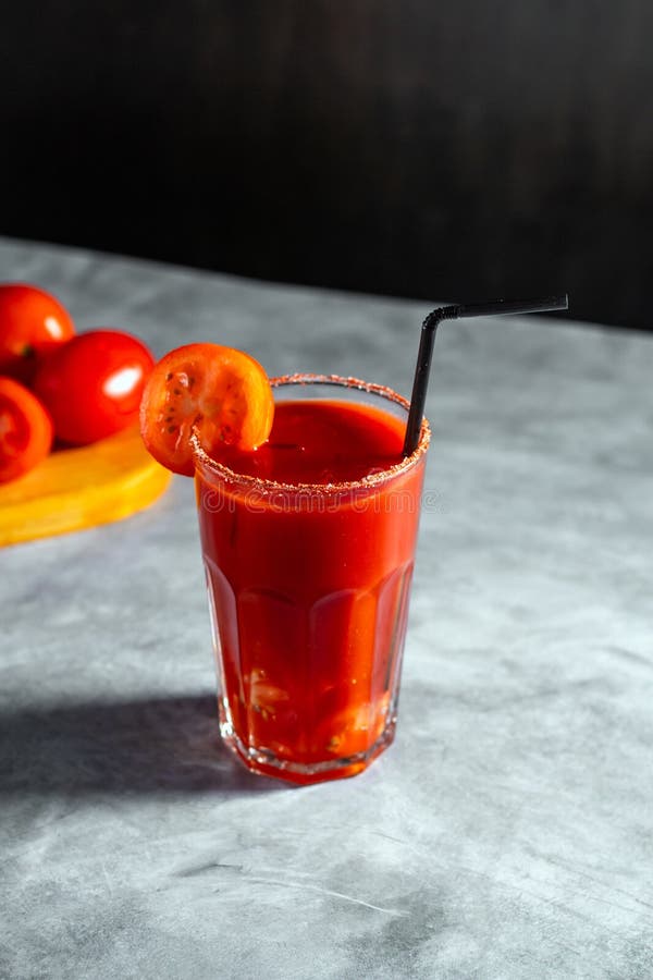 Refreshing Vegetable Cocktail. Tomato Juice Served in Glass with Tomato ...