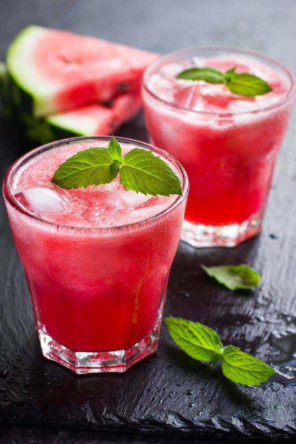Refreshing Watermelon Cocktail with Ice and Mint Stock Photo - Image of ...